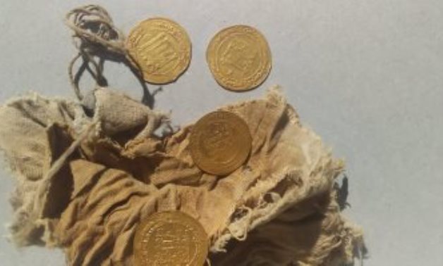 Egypt uncovers 28 gold dinars dating back to Abbasid era in Fayoum ...